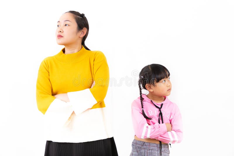 The Image of an Asian Mother and Daughter Being Angry in a White ...