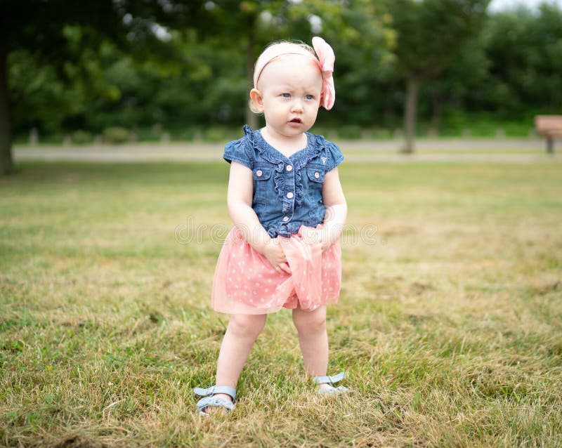 Baby playing outside stock image. Image of grass, baby - 122238529