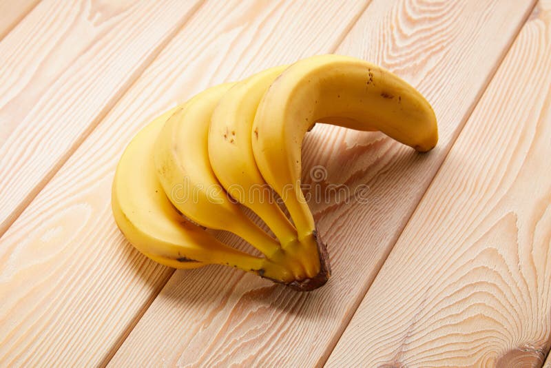 Horizontal Image of Banana Cluster on Wooden Table Stock Image - Image ...
