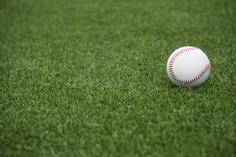 Baseball on grass stock image. Image of ball, lawn, play - 133875297