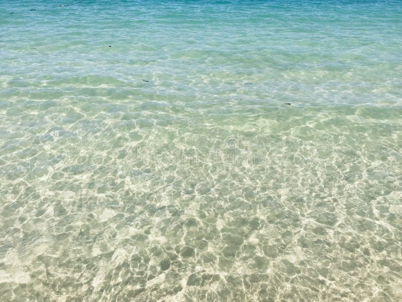 The Image of the Beach and the Bright Blue Sea Stock Photo - Image of ...