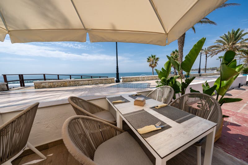 Beachfront Restaurant Table Along the Boulevard on Marbella Stock Image ...
