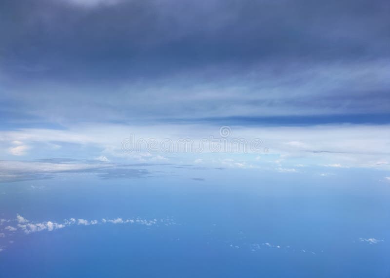 Image of Beautiful Blue Sky and Blue Ocean Seen from Airplane Stock ...