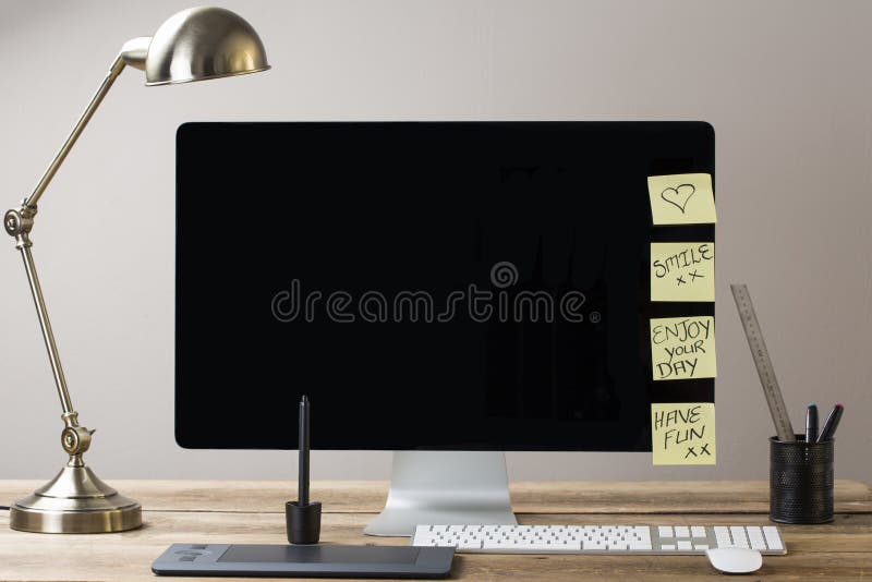 Image of a Big Computer Screen with a Lamp and Stationary Items Stock ...