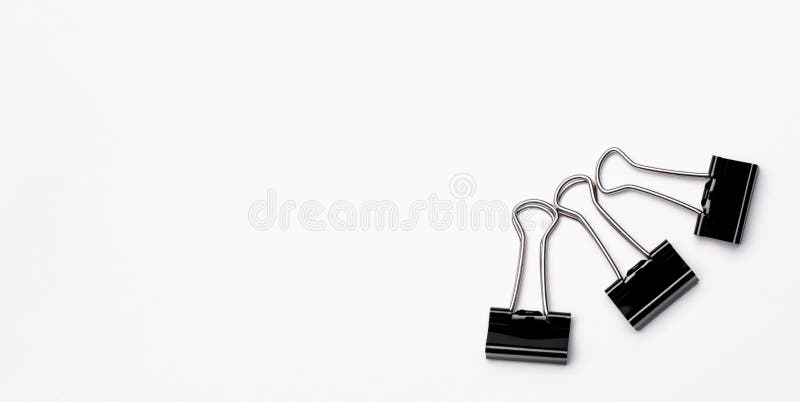 An Image of Black Paper Clips on White Stock Photo - Image of office ...