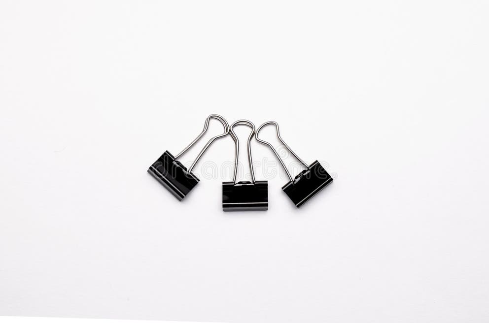 An Image of Black Paper Clips on White Stock Image - Image of separator ...