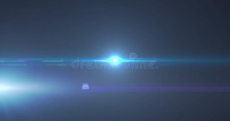 Image of Blue Spotlight with Lens Flare and Light Beams Moving Over ...