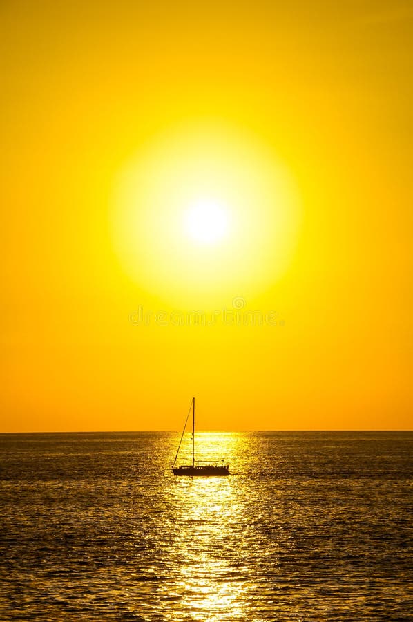 Image of a Boat in the Water Under the Yellow Sunlight during the ...