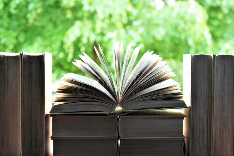 An Image of Book in Front of a Open Window Stock Photo - Image of ...