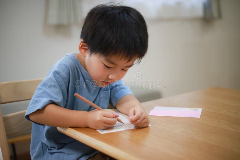 Boy writing a letter stock photo. Image of copy, indoors - 248725098