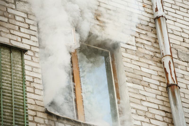 Smoke in the window stock image. Image of help, loss, roof - 3373735