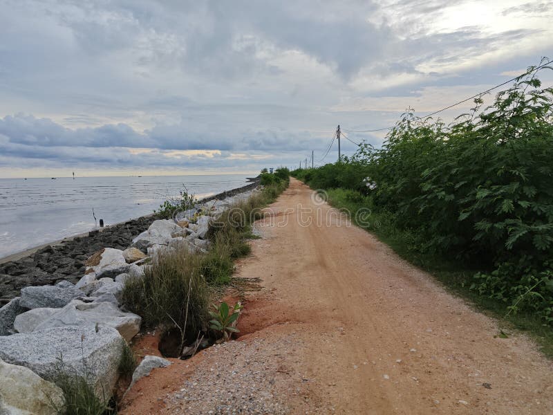 Brown Earth Pathway Along the Side of the Beach Stock Image - Image of ...