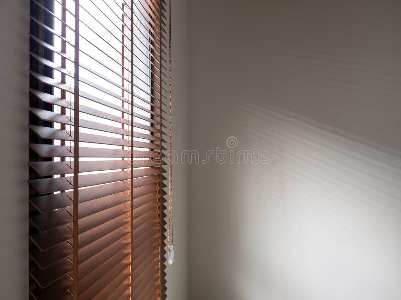Image of Brown Wooden Window Blinds Ropes Being Pulled Open To Allow ...