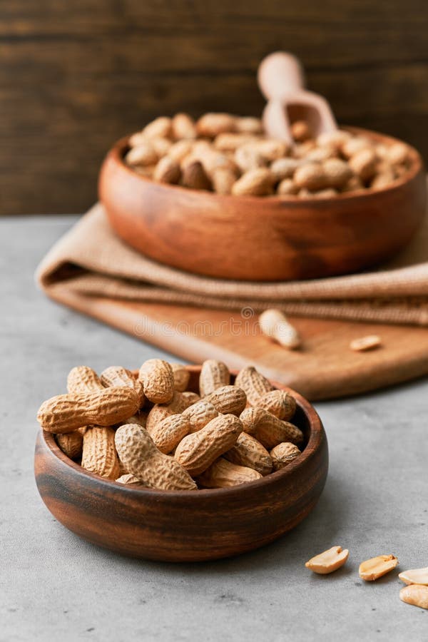 Image of Bunch of Peanuts in a Bowl on a Concrete Surface Stock Photo ...