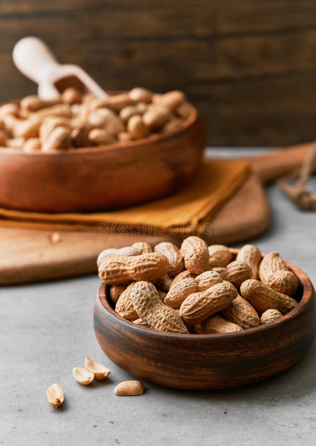 Image of Bunch of Peanuts in a Bowl on a Concrete Surface Stock Image ...