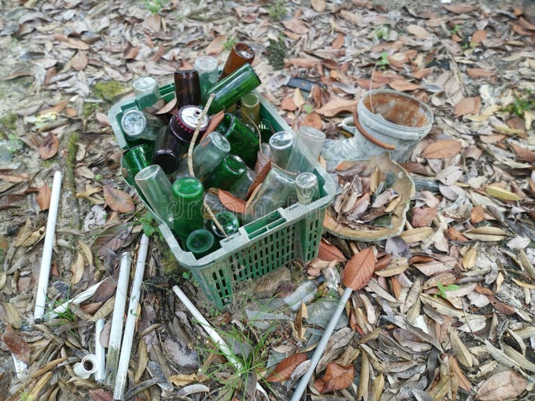 Big Plastic Bucket of Empty Bottles Left on the Ground. Stock Photo ...