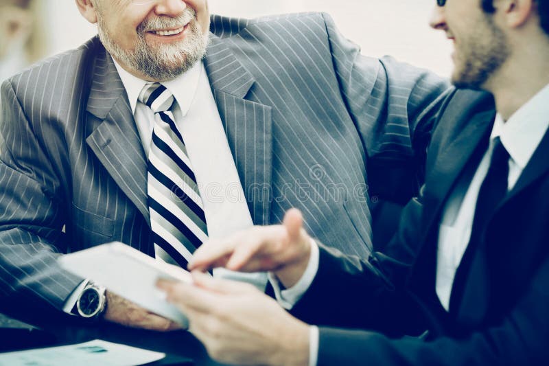 The Image of Business Partners Discussing Documents and Discussing with ...