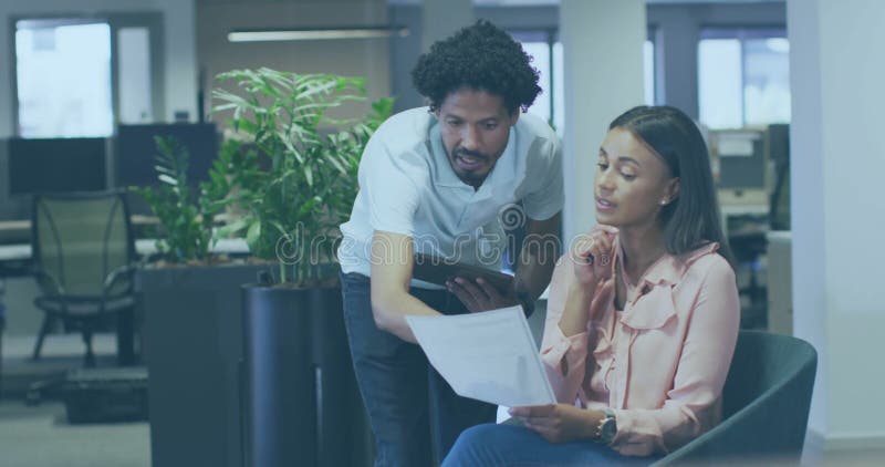Image of Business Professionals Discussing Documents in Office Stock Image - Image of analysis ...