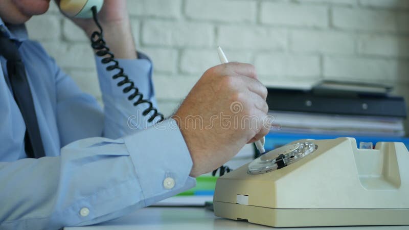 Image with a Businessman in the Office Room Standing and Talking on a ...