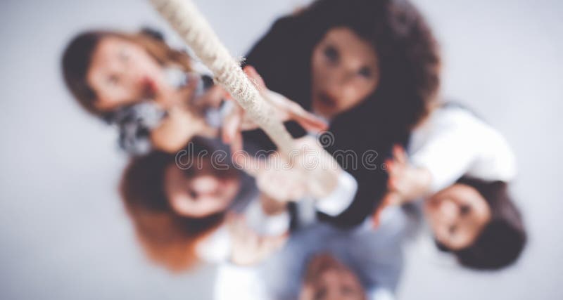 Image of Businesspeople Ascending Up the Rope Stock Photo - Image of ...
