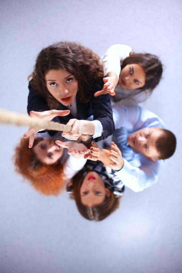 Image of Businesspeople Ascending Up the Rope Stock Image - Image of ...