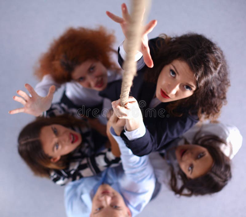 Image of Businesspeople Ascending Up the Rope Stock Image - Image of ...