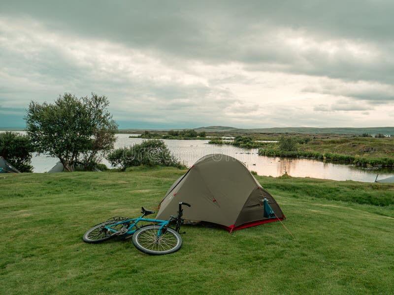Image of Camping Side with Tents and Bicycles at the Lake Stock Photo ...