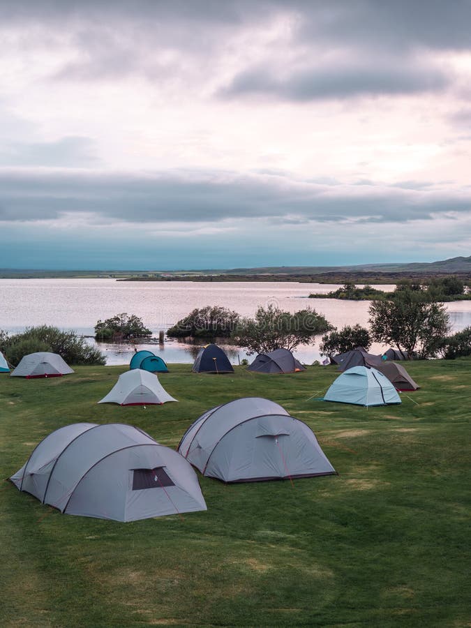 Image of Camping Side with Tents and Bicycles at the Lake Stock Image ...