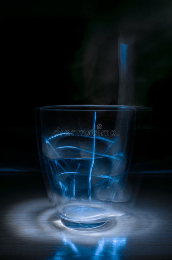 Beam of light in a glass stock photo. Image of front - 136984960
