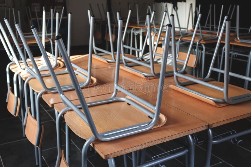 Classroom with Tables and Chairs Stacked Together Stock Photo - Image ...