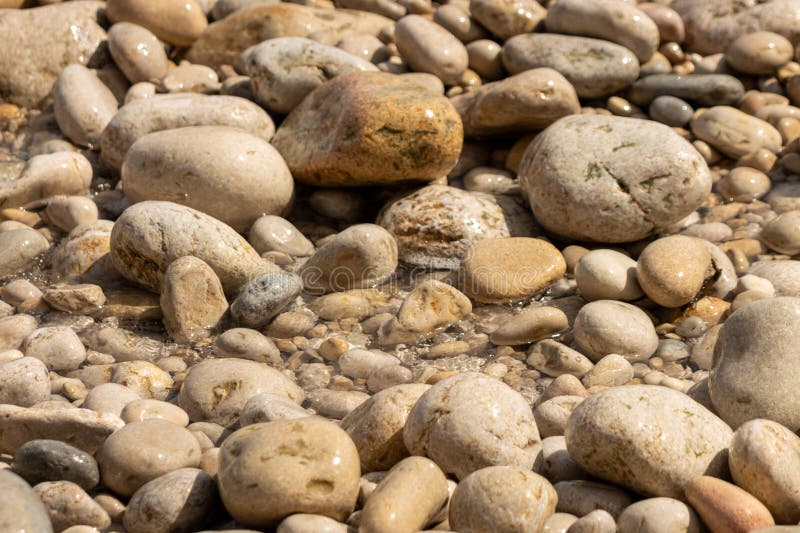 Close-Up of Rounded Stones and Pebbles Background Stock Image - Image ...