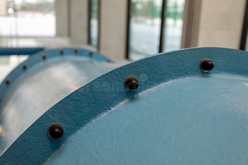 This Image Captures a Detailed Closeup of a Blue Industrial Pipe ...