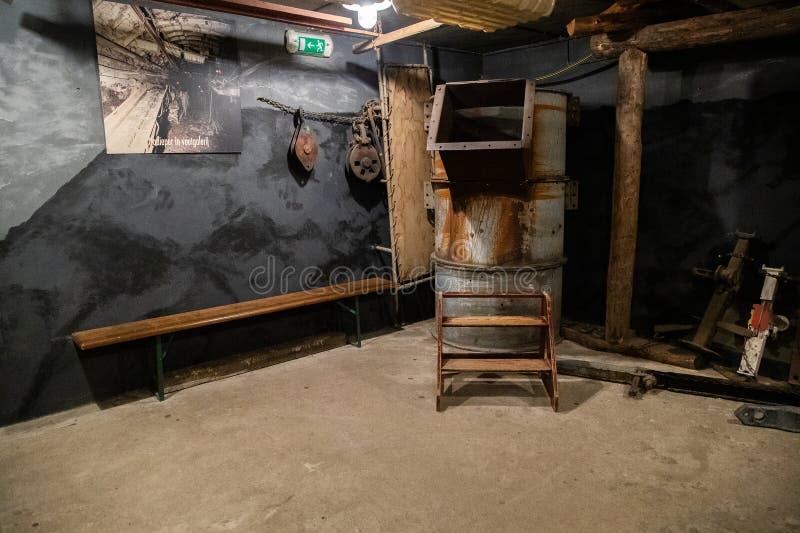 Historic Underground Coal Mine Interior with Rusty Equipment and Wooden ...