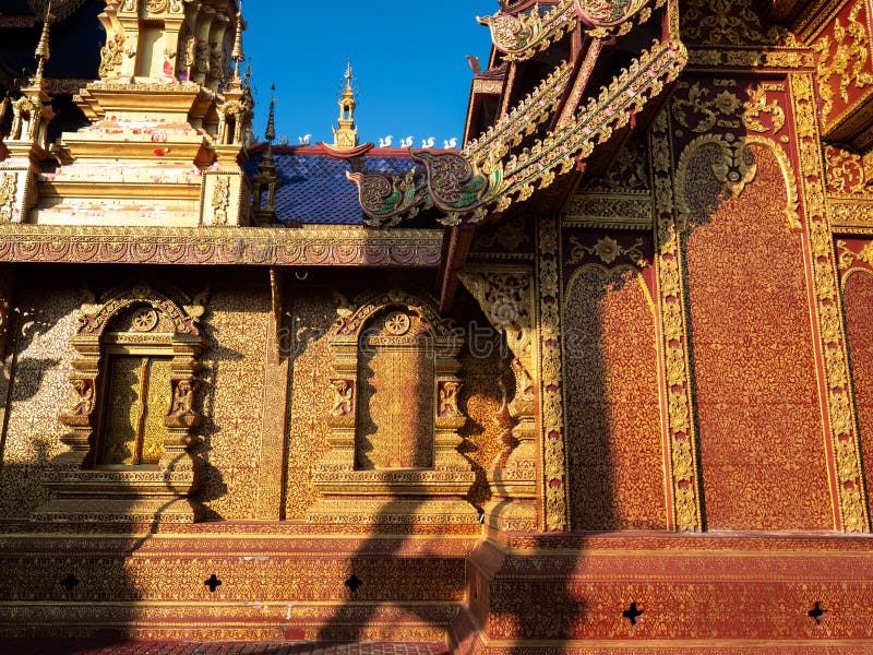 Gilded Patterns: Light and Shadow on Temple Walls Stock Photo - Image ...