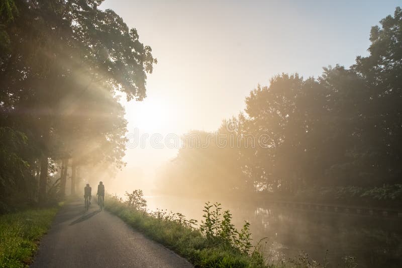 Misty Riverside Walk at Sunrise Stock Photo - Image of ethereal ...
