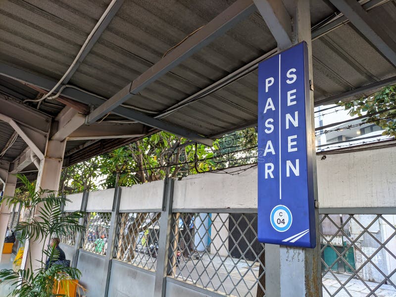 Blue Station Sign Featuring Pasar Senen with Train Platform ...