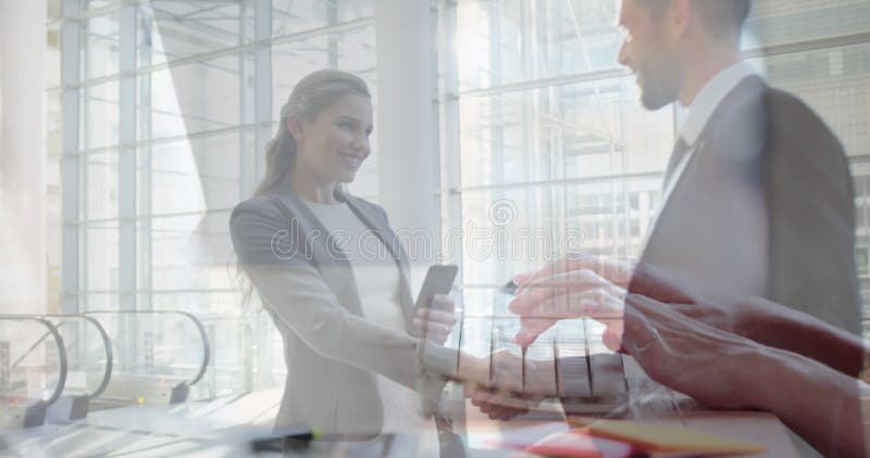 Image of Caucasian Businesswoman Shaking Hands and Using Computer Stock ...