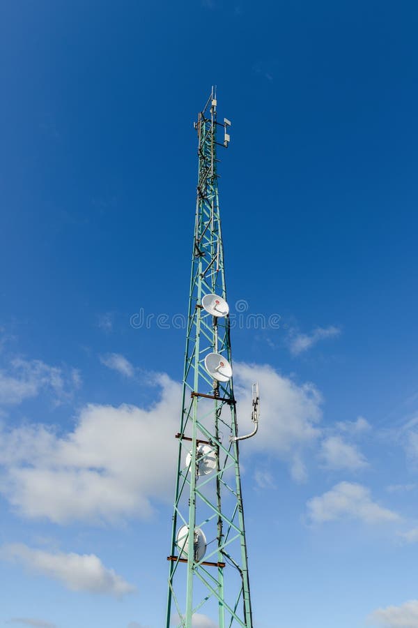 Cellular Antennas Against a Blue Sky Stock Image - Image of line, mast ...