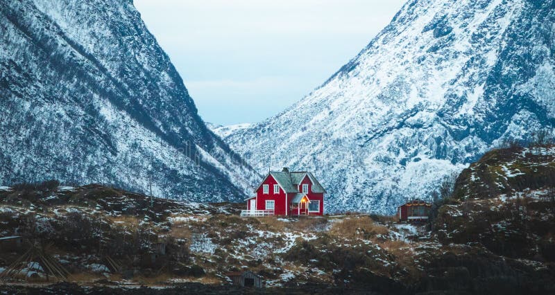 A Red House in Front of a Mountain Range and Mountains Stock Image ...