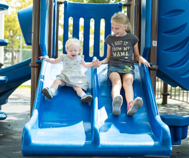 Children Playing at Playground Stock Photo - Image of outdoors, girl ...