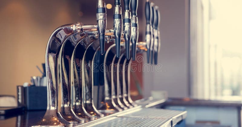 Image of Close Up of Beer Tabs in Bar Stock Illustration - Illustration ...