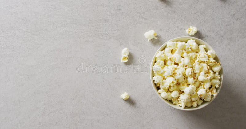Image of Close Up of Box of Popcorn on Gray Background Stock Image ...