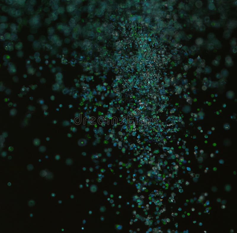 Image of Close Up of Multiple Green Particles on Dark Background Stock ...