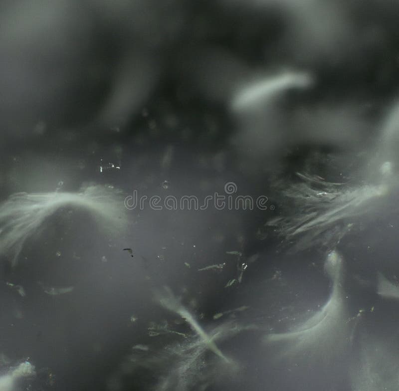 Image of Close Up of White Wisp on Black and Grey Background Stock ...