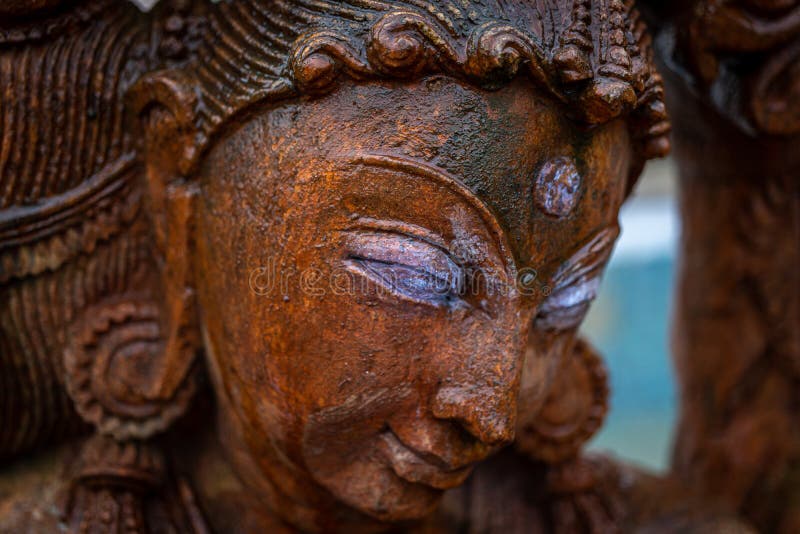 Image of a Closeup Face of a Sculpture with Sharp Features Stock Photo ...