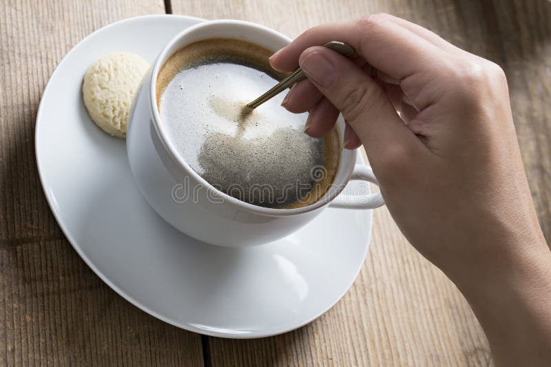 A Cup of Tea Being Stirred. Stirring Tea with Spoon in Slow Motion ...