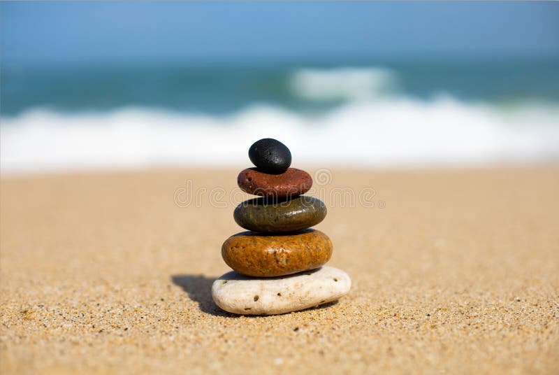 Close-up of Zen Stacked Pebbles on Sandy Beach Stock Photo - Image of ...