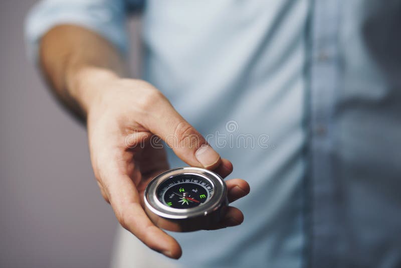 Man hand compass stock photo. Image of journey, assistance - 134426092