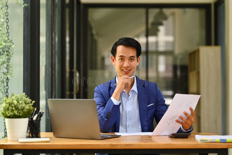 Image of Confident Male Analyst Working Bookkeeping Documents, Checking ...