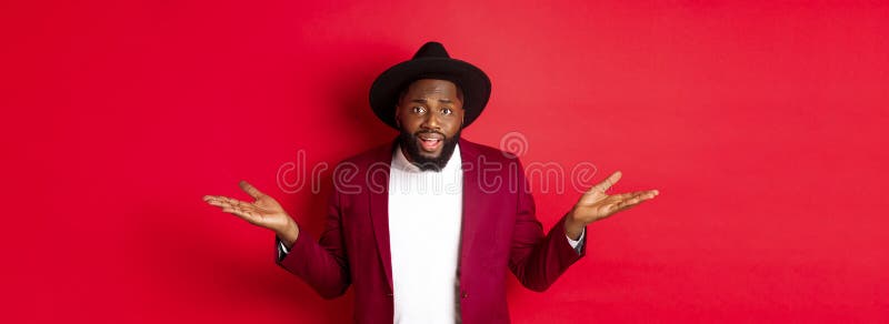 Image of Confused Black Man Asking Question, Spread Hands Sideways and ...